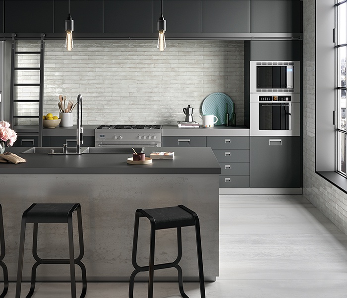 Metallic kitchen tiles add a warm glow to your space
